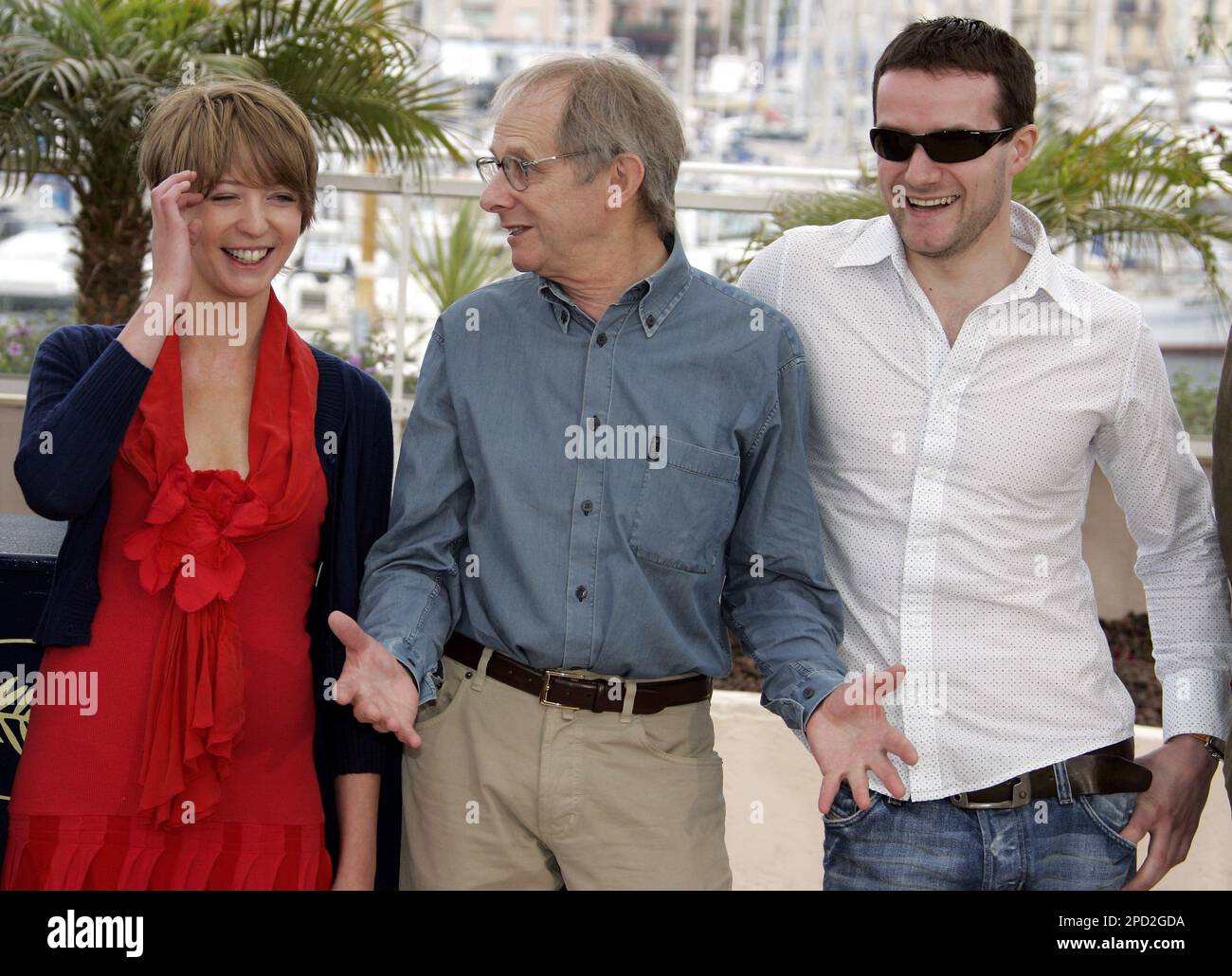 British director Ken Loach, center, gestures as he poses with Irish ...