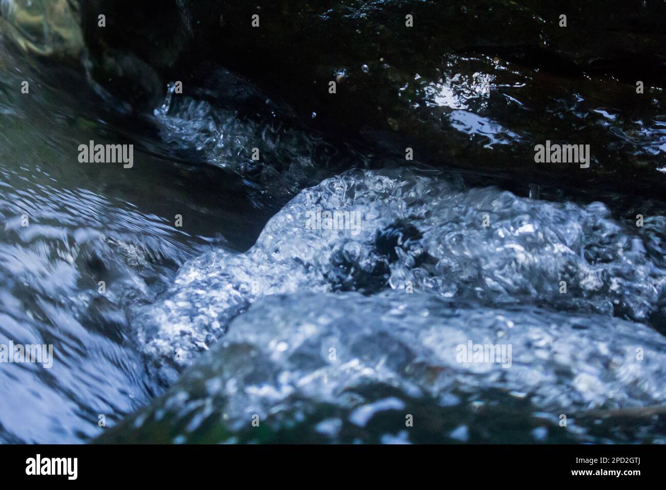 Waterfall flows along river in hi-res stock photography and images - Alamy
