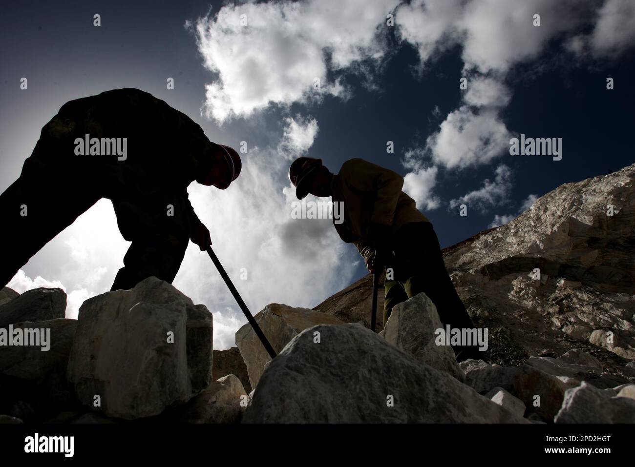 Jade miners work at a jade mine in the Kunlun mountains in China's ...