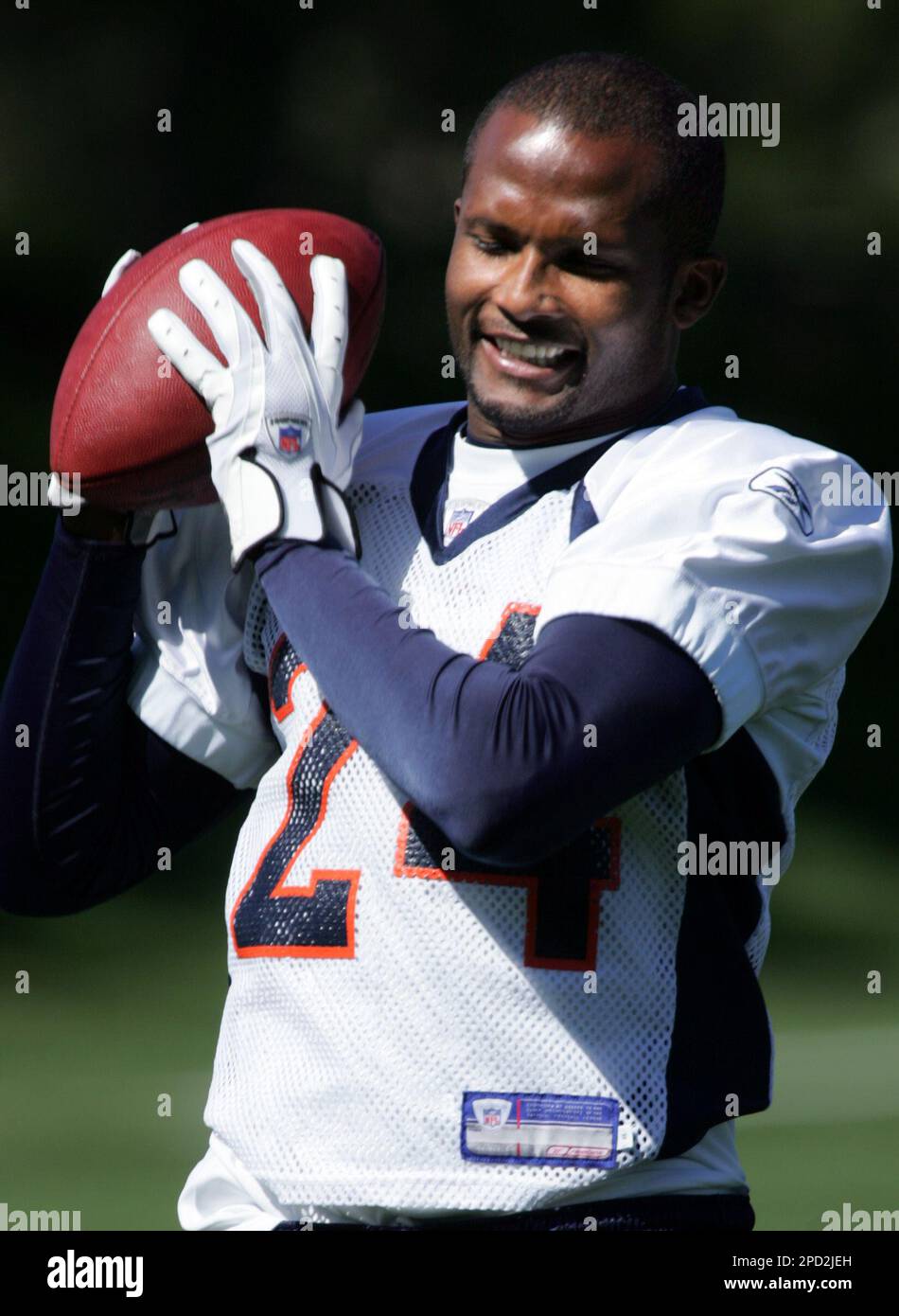 Denver Broncos cornerback Champ Bailey catches a ball during a drill in ...