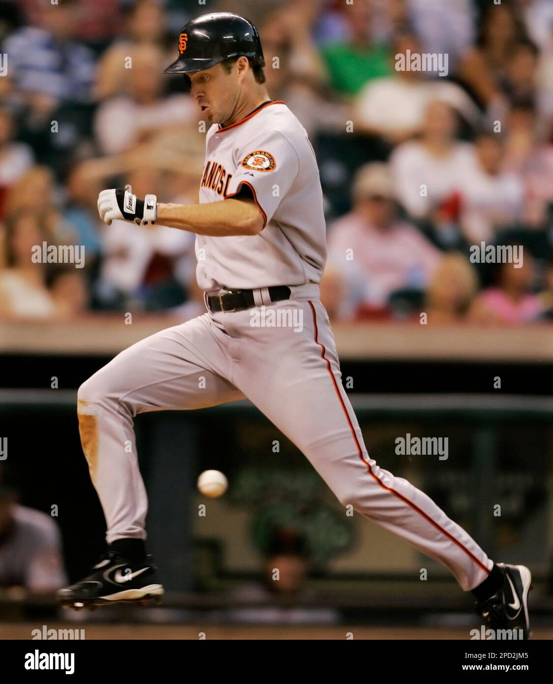 San Francisco Giants' Steve Finley beats the ball to score on a double ...