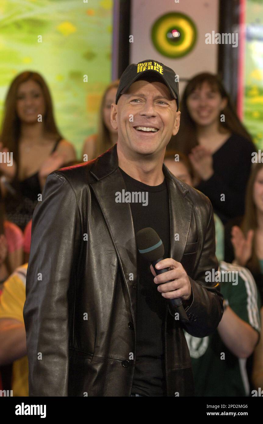Actor Bruce Willis appears onstage during MTV's 'Total Request Live' at ...