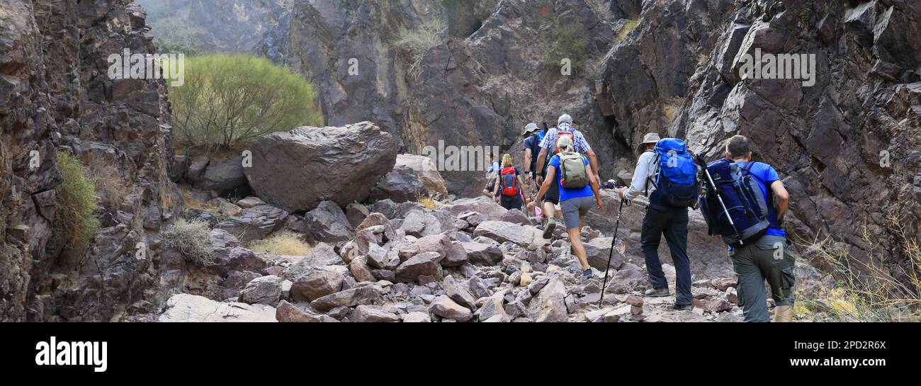 Walkers in the Naqad Gulley, Jabal Fied, Al-Sharat area of Jordan ...