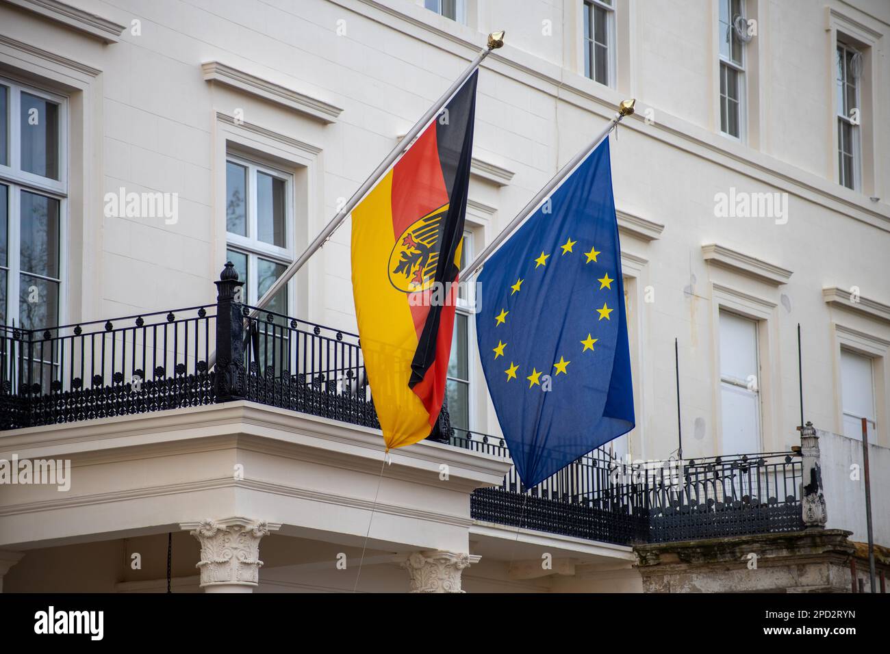 The EU and German flags fly proudly in front of the German embassy in ...