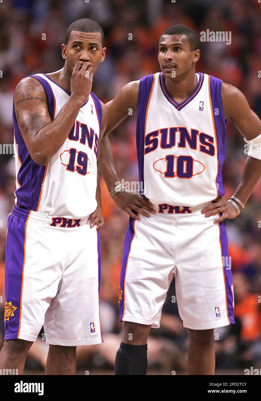 Phoenix Suns' Raja Bell (19) and Leandro Barbosa, of Brazil, watch as ...