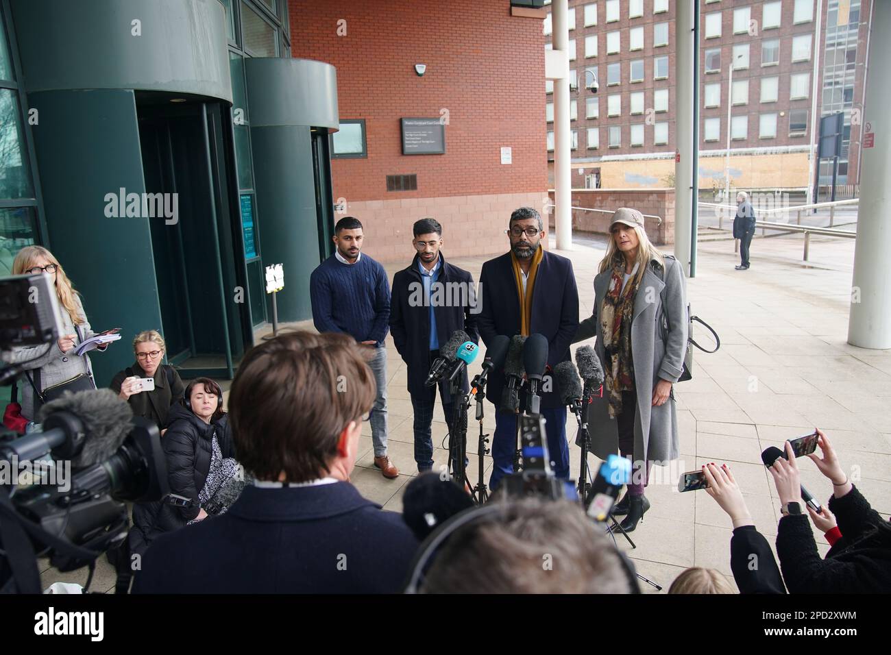 Mohammed Ramzan (second right), who was accused of trafficking by ...
