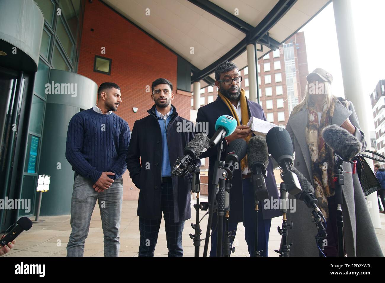 Mohammed Ramzan (second right), who was accused of trafficking by ...
