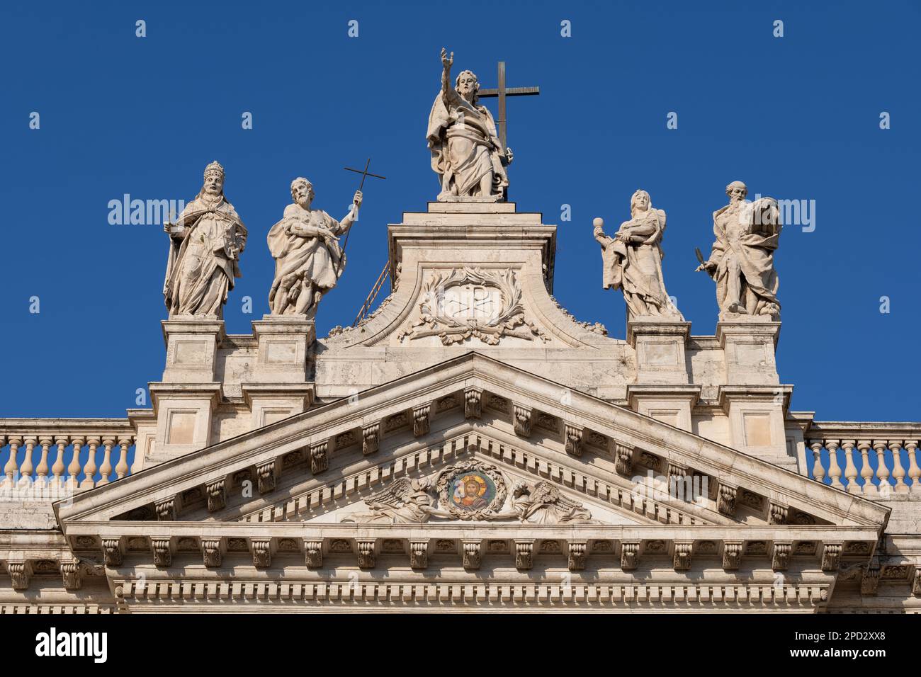 Pediment and statue of Christ the Redeemer at Basilica di San Giovanni ...