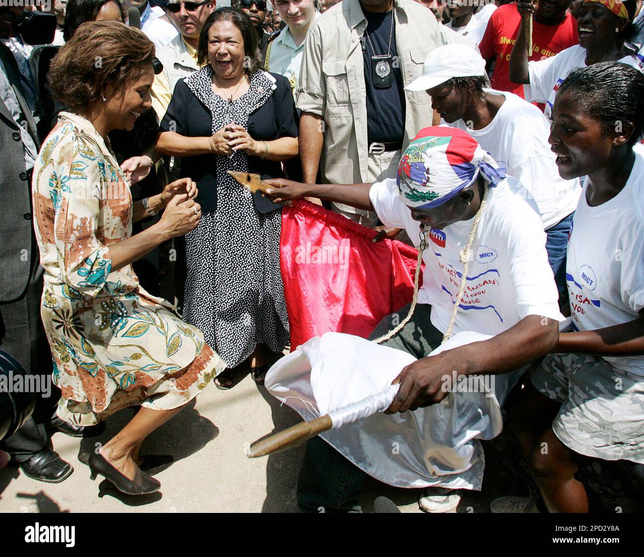 Governor General Michaelle Jean dances with people in the Haitian town ...