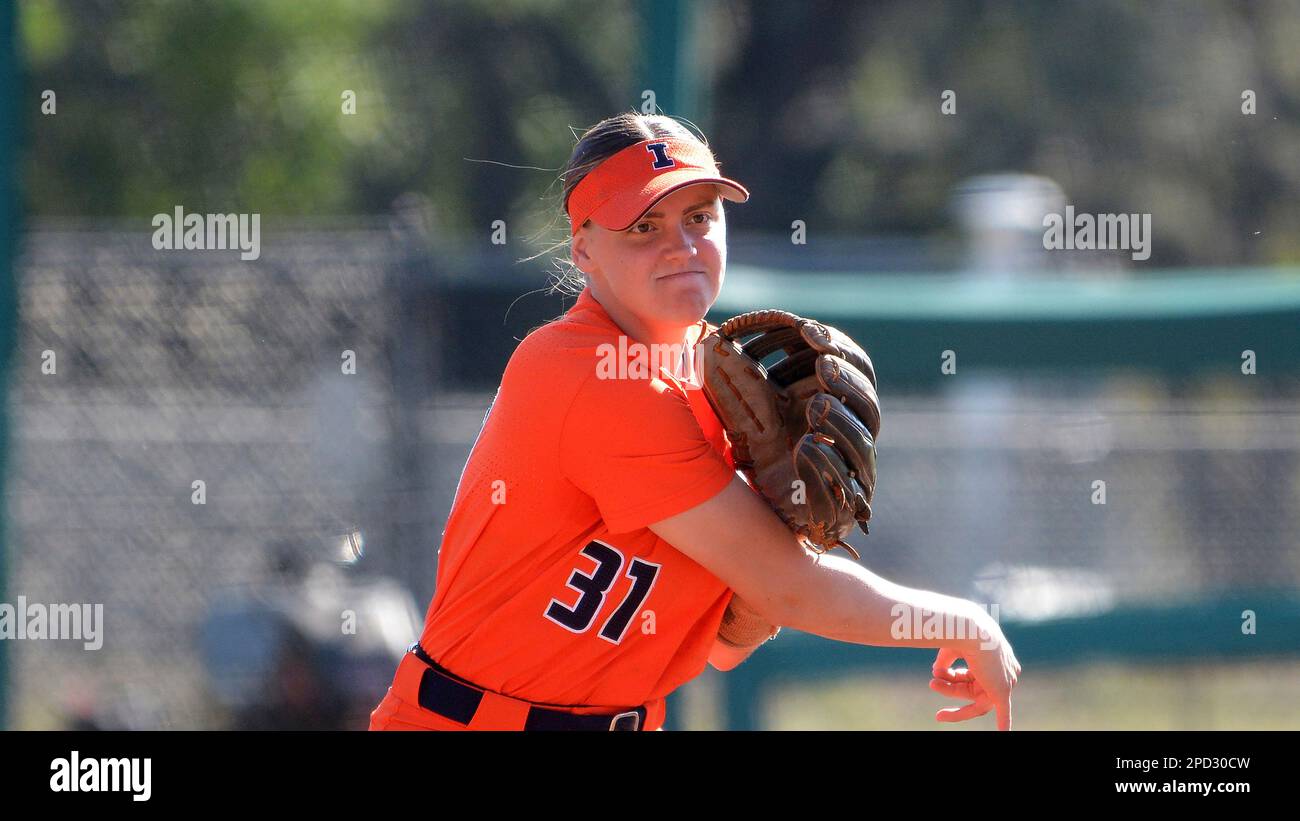 University of Illinois infielder Megan Ward (31) fires to first during ...