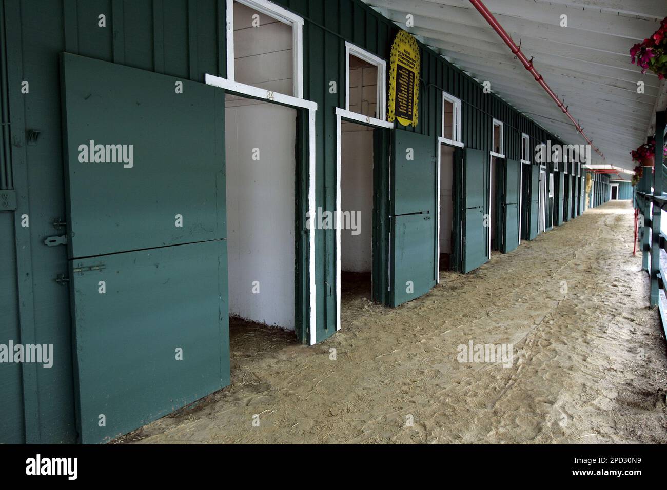A quiet row of stalls is seen at the Preakness Stakes barn at the ...