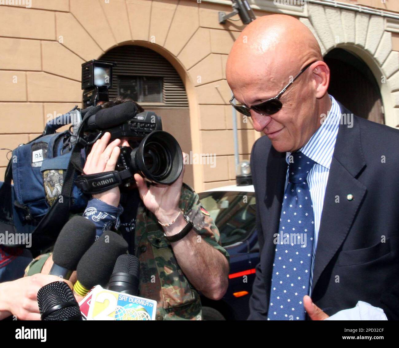 Italian former soccer referee Pierluigi Collina is mobbed by ...