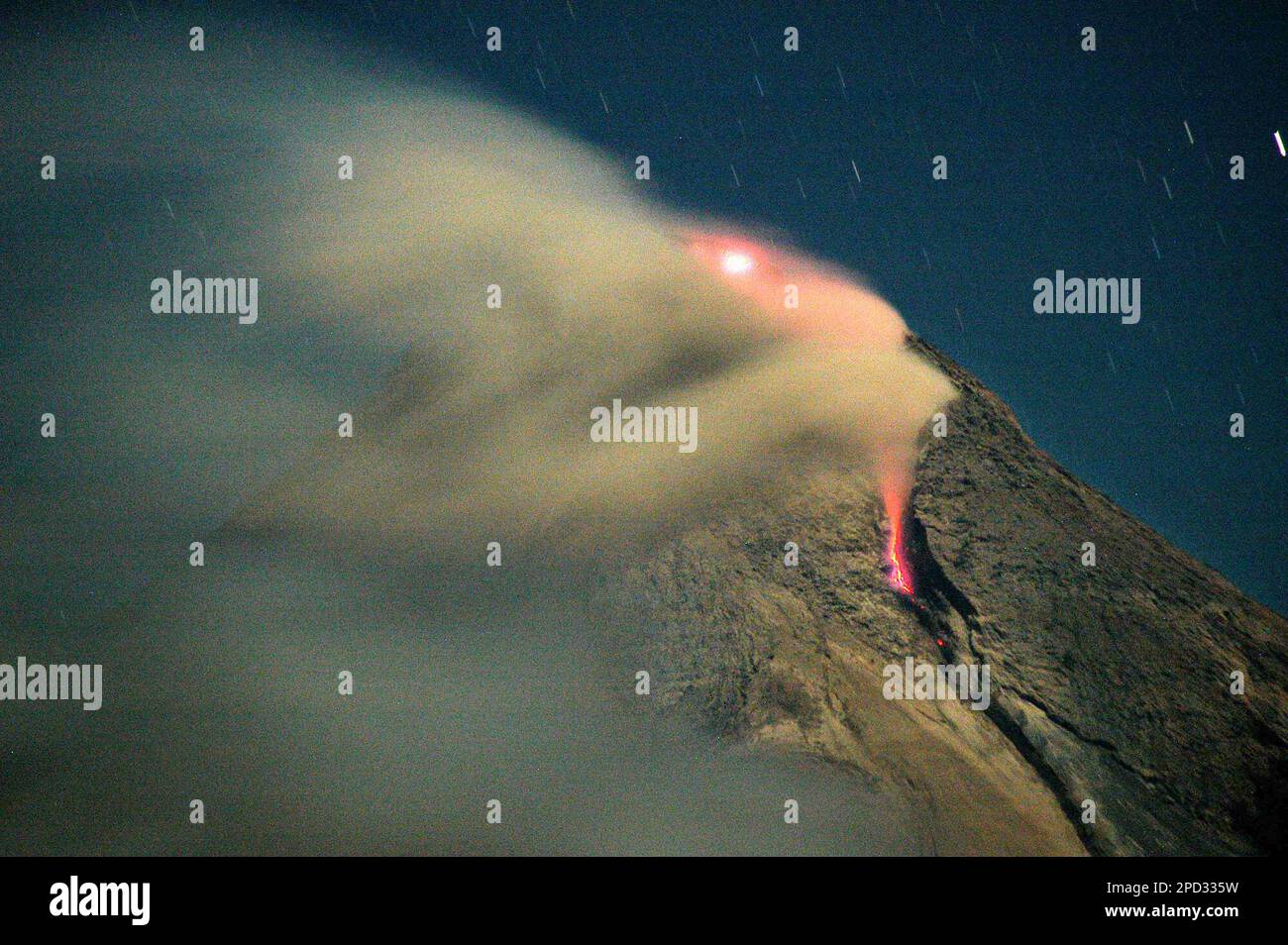 Lava flows on the slopes of Mount Merapi in this picture taken from ...