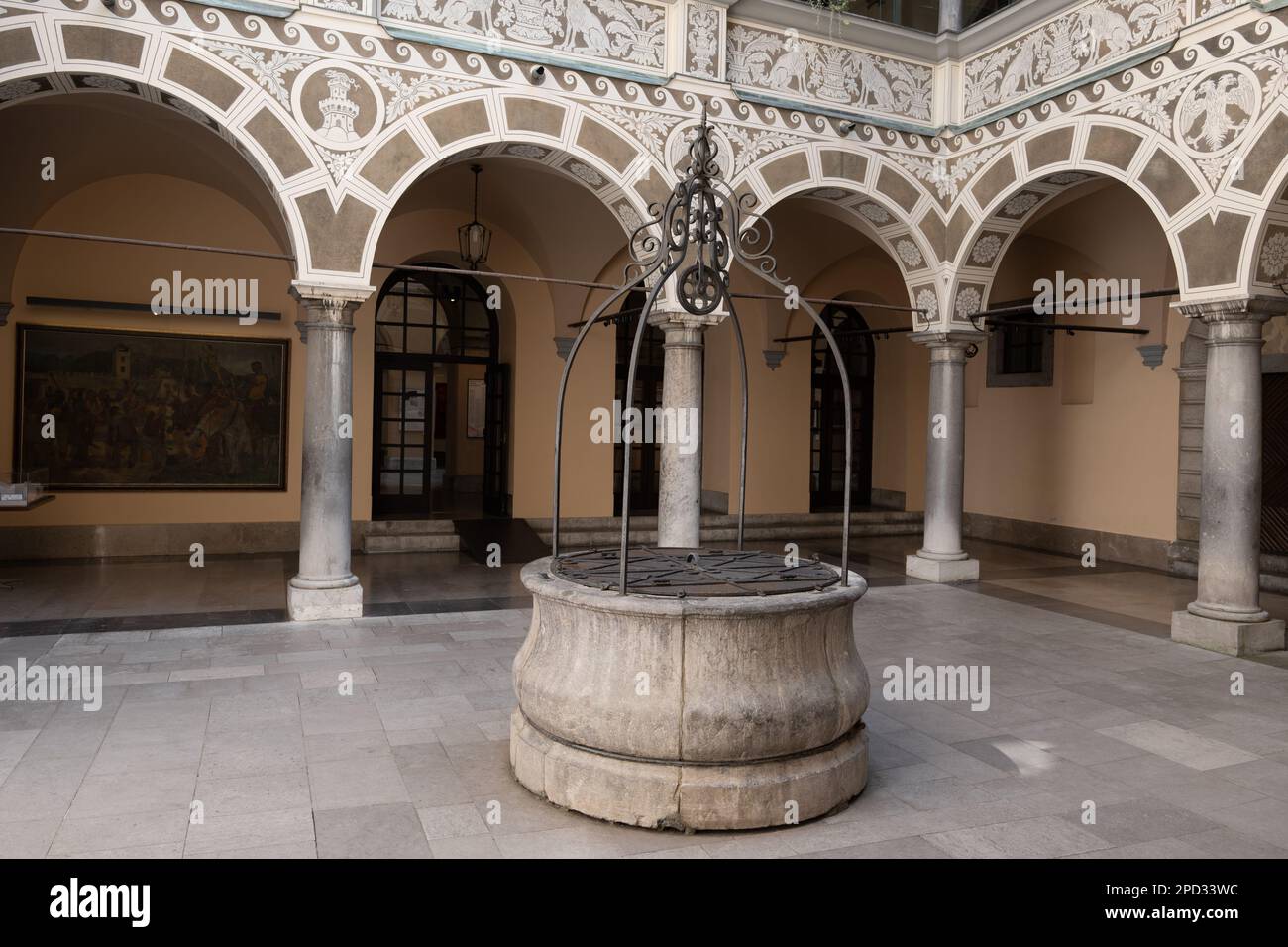Central Atrium in the Town Hall, arcaded Baroque courtyard with well in ...