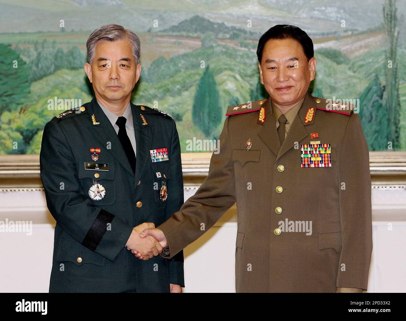 South Korea's chief negotiator Maj. Gen. Han Min-koo, left, shakes ...