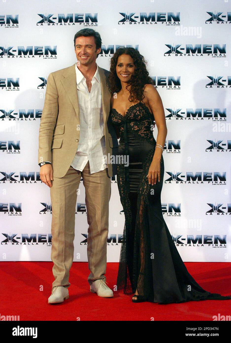 Actors Hugh Jackman, left, and Halle Berry arrive for the premiere of ...