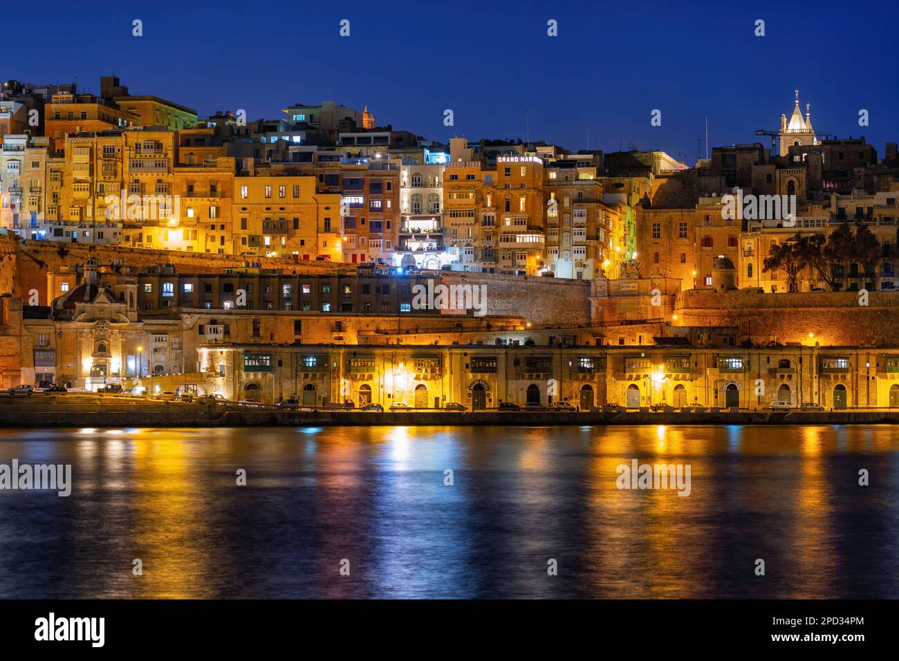 City of Valletta by night in Malta, skyline from the Grand Harbour with ...