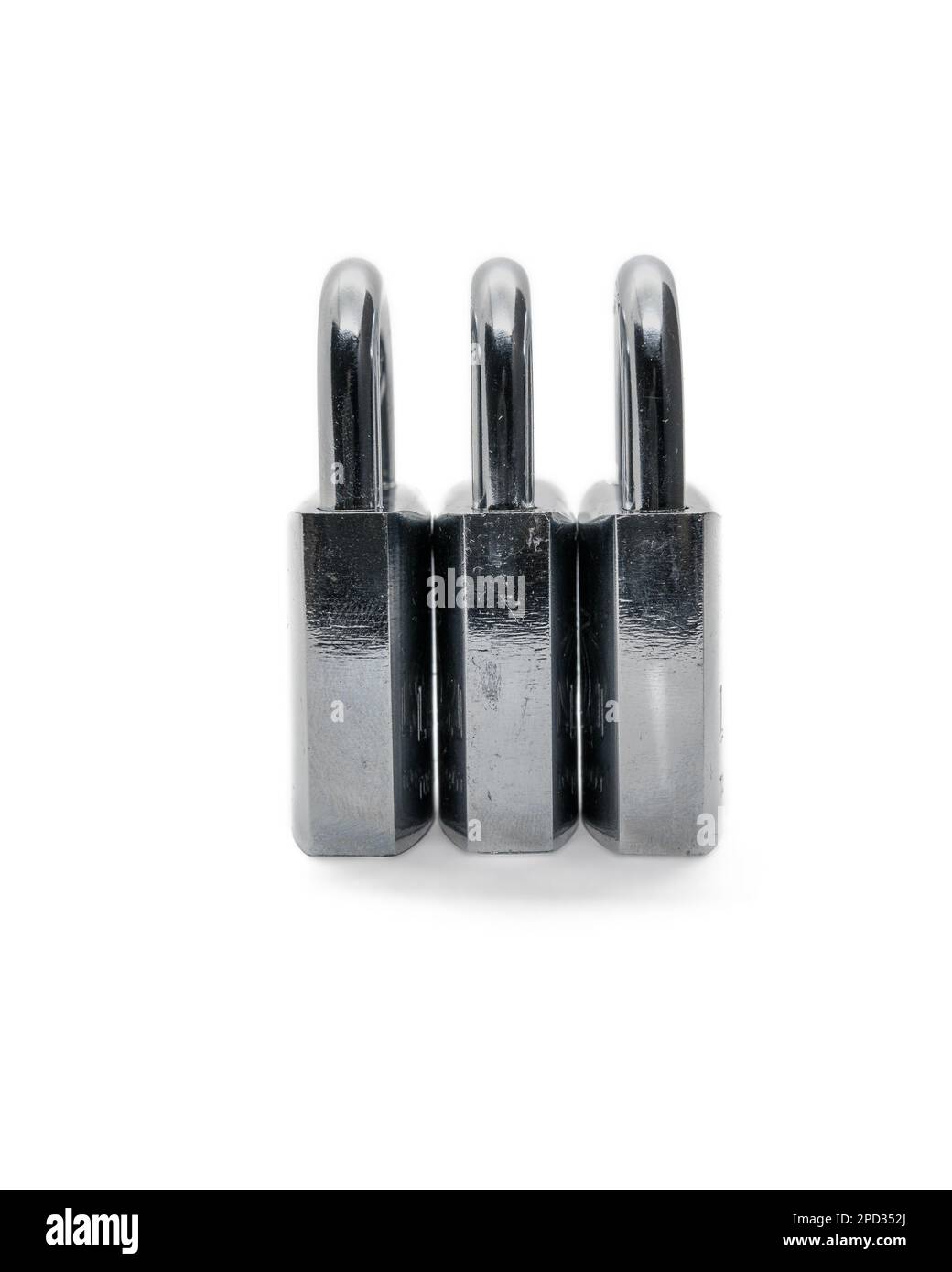 Three steel padlocks side by side, isolated on white background, side ...