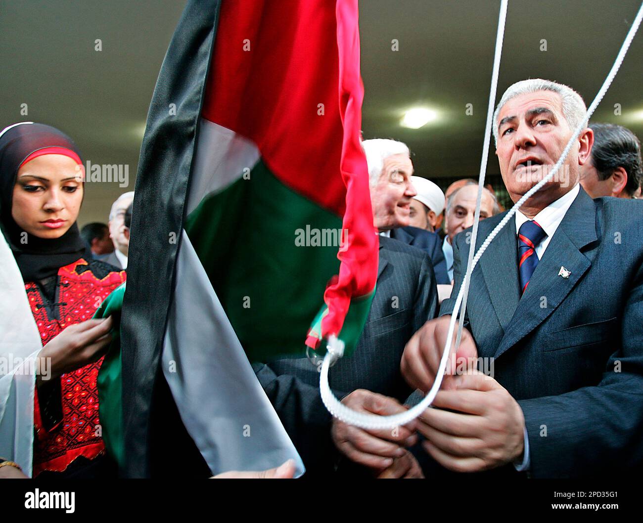 Palestinian mainstream Fatah movement official Abbas Zaki, right ...