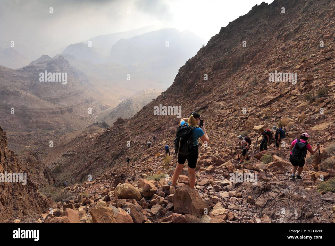 Walkers on Naqib Shadyed at the top of Naqad Gulley, Jabal Fied, Al ...