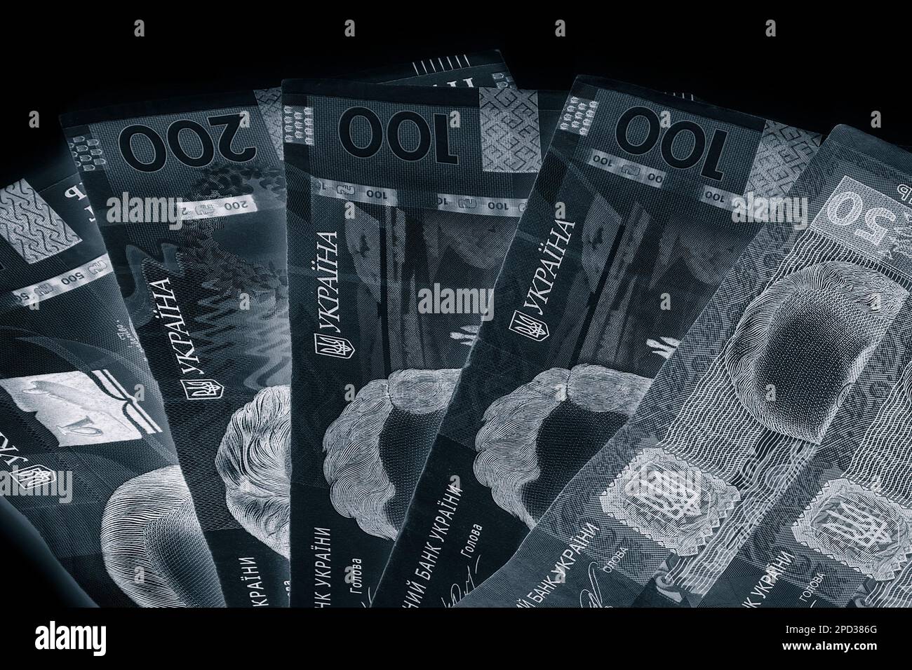 The hryvnia or hryvna national currency of Ukraine. Dark photo with ...