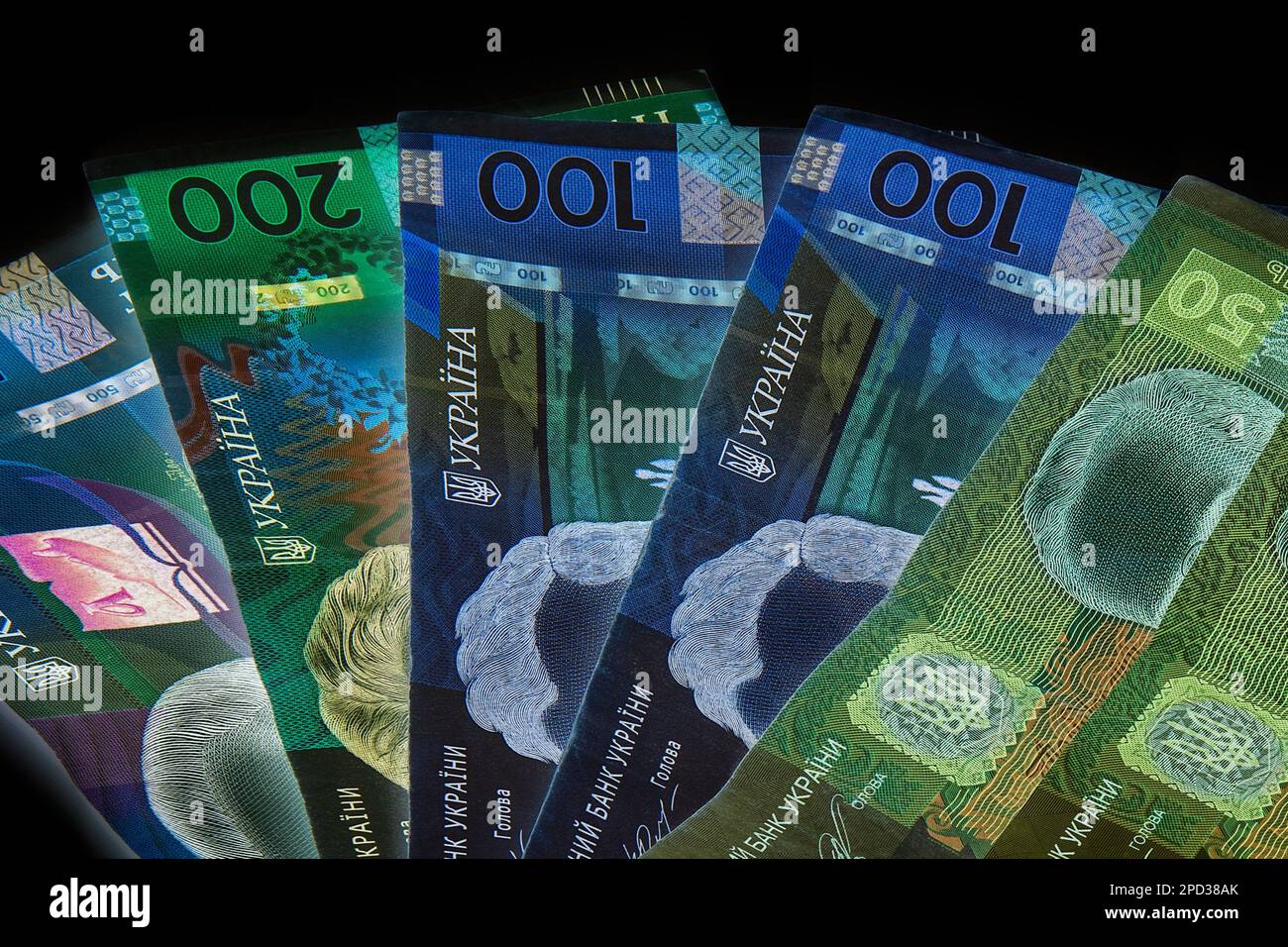 The hryvnia or hryvna national currency of Ukraine. Dark photo with ...