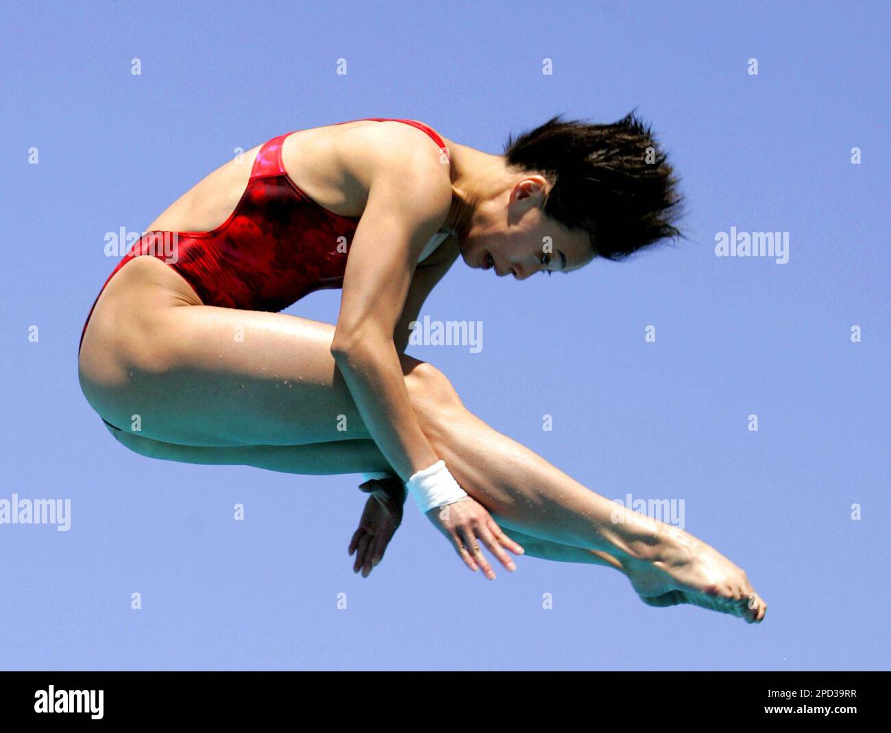 Li Ting, of China, competes in the women's 3-meter springboard final at ...