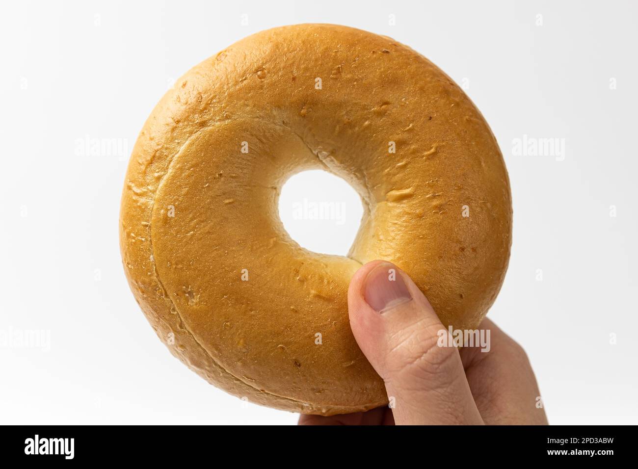 plain bagel on a white background Stock Photo - Alamy