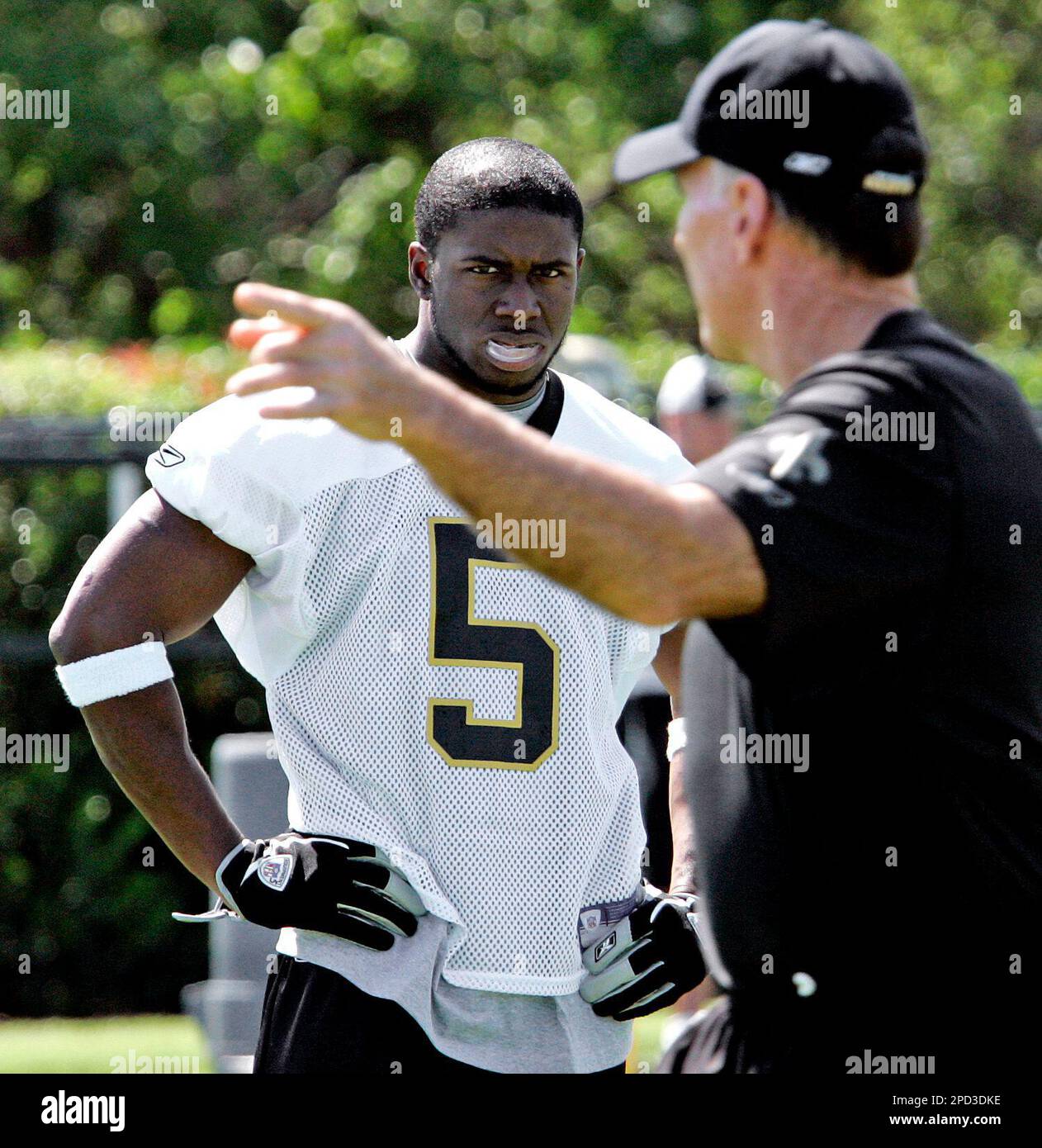 New Orleans Saints first round draft pick Reggie Bush (5) listens to ...