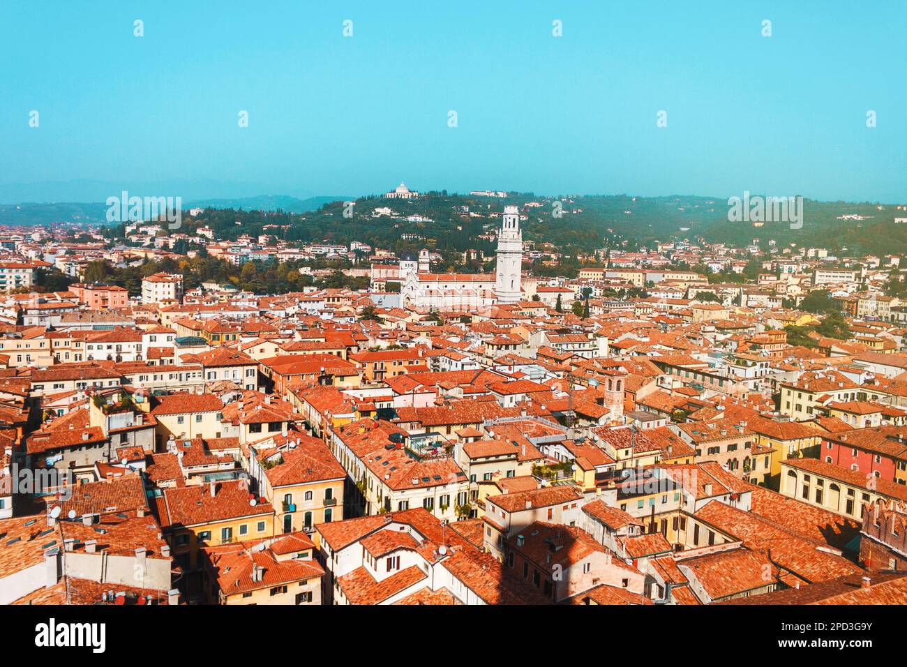 Sunny day in Verona, Italy. View from above on old town red roofs ...