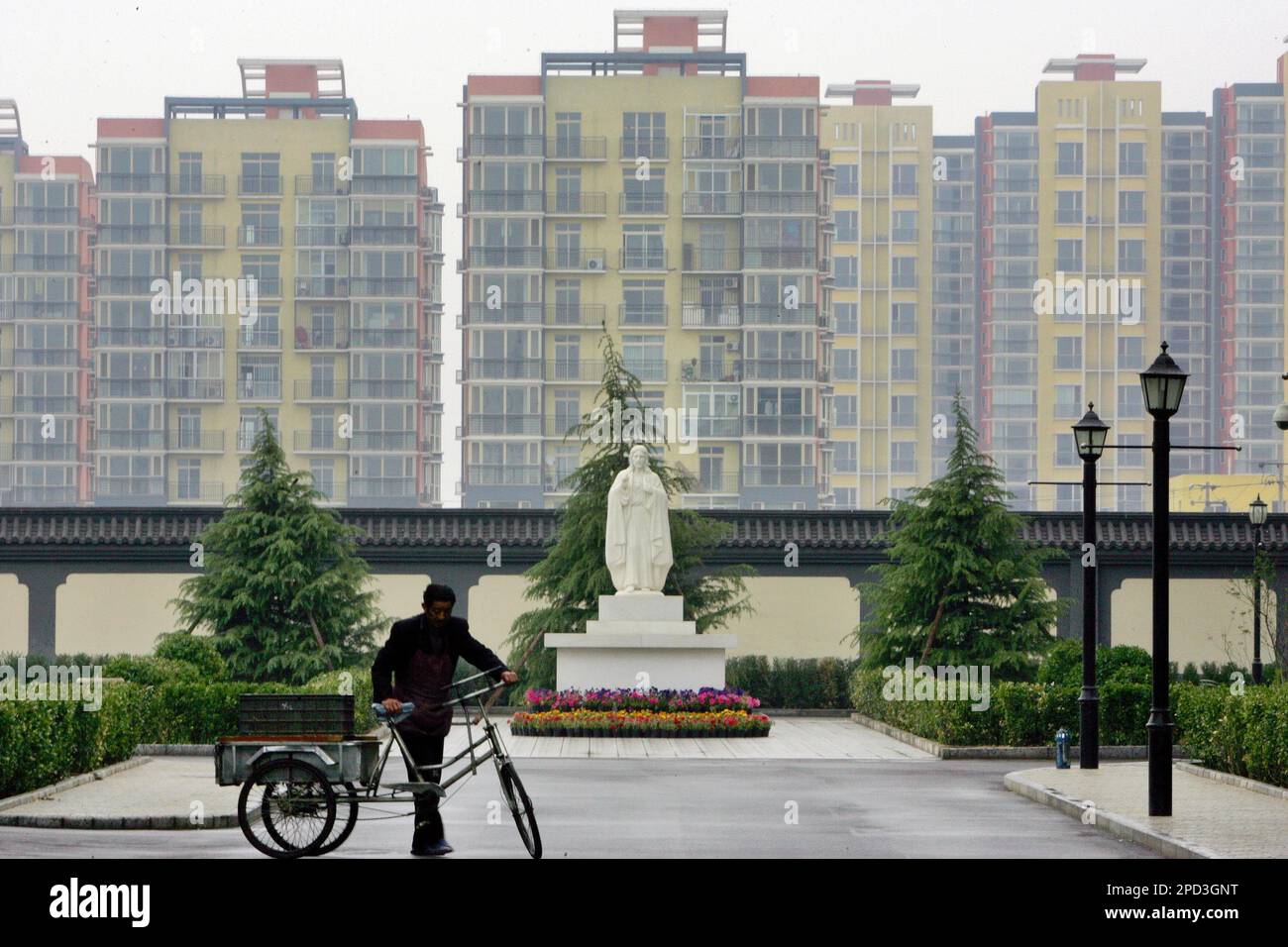 A sacred heart of Christ statue adorns the gardens of the National ...