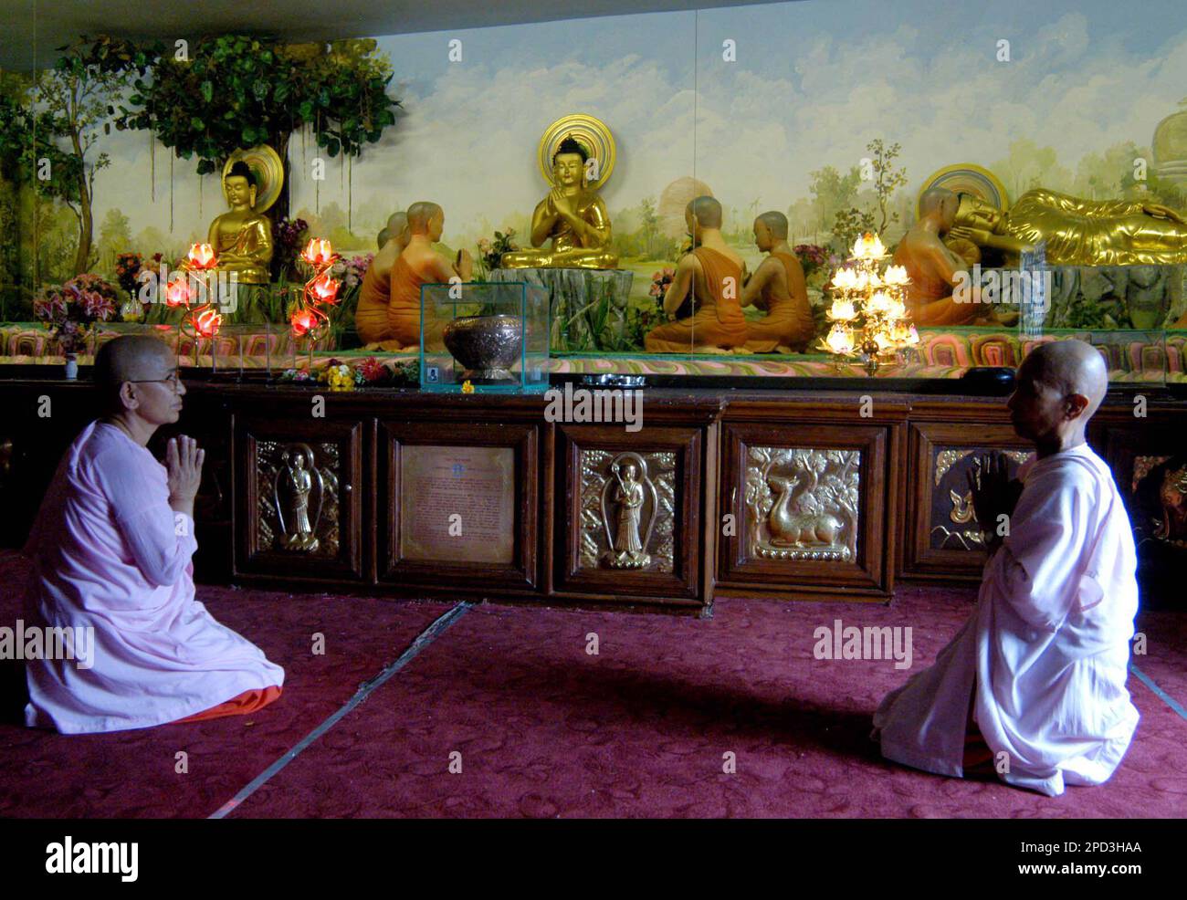 Nepalese Buddhist monks pray at a monastery in Katmandu, Nepal ...