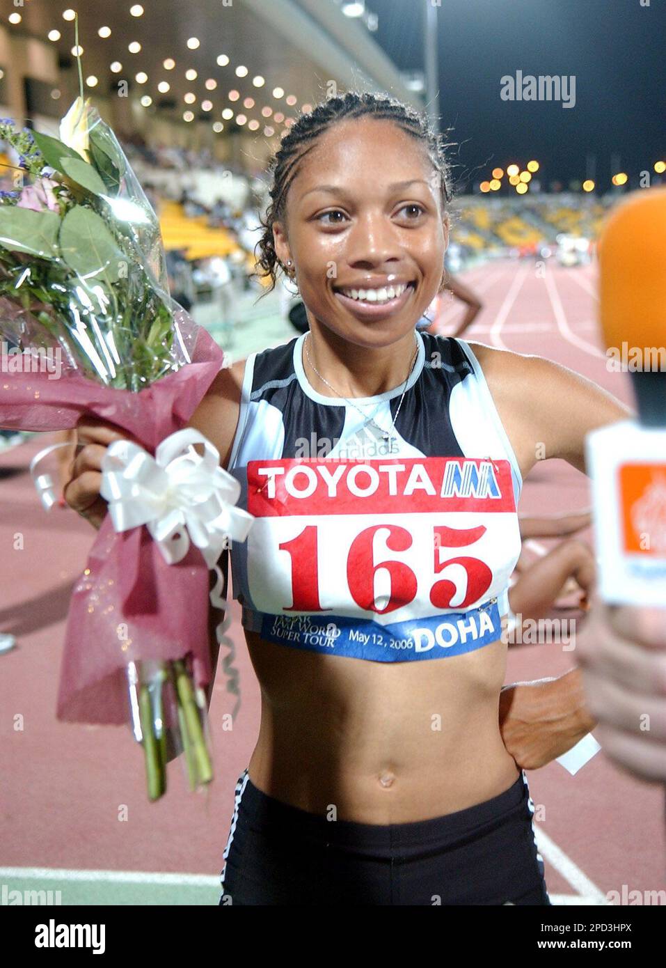 American sprinter Allyson Felix celebrates her victory in the 200 ...