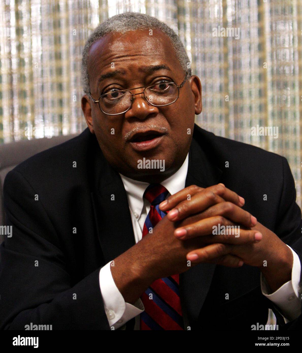 Criminal District Court Judge Calvin Johnson speaks during an interview ...