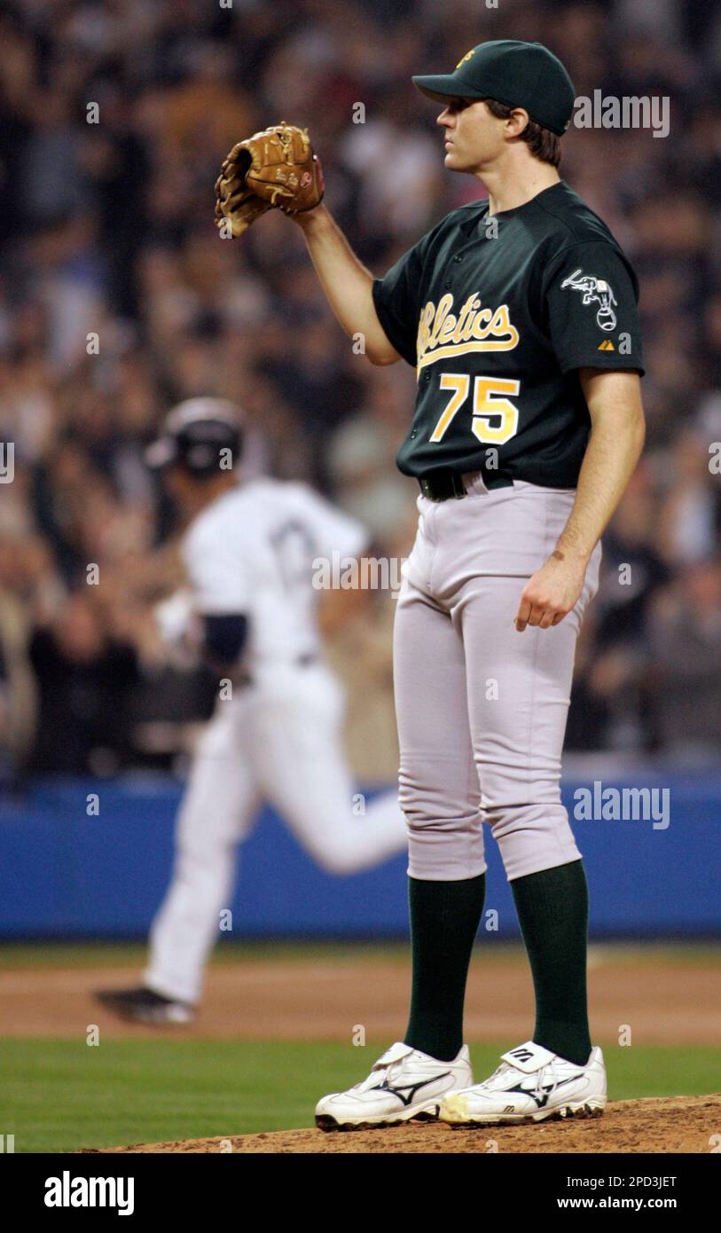 Oakland Athletics pitcher Barry Zito (75) reacts as New York Yankees ...