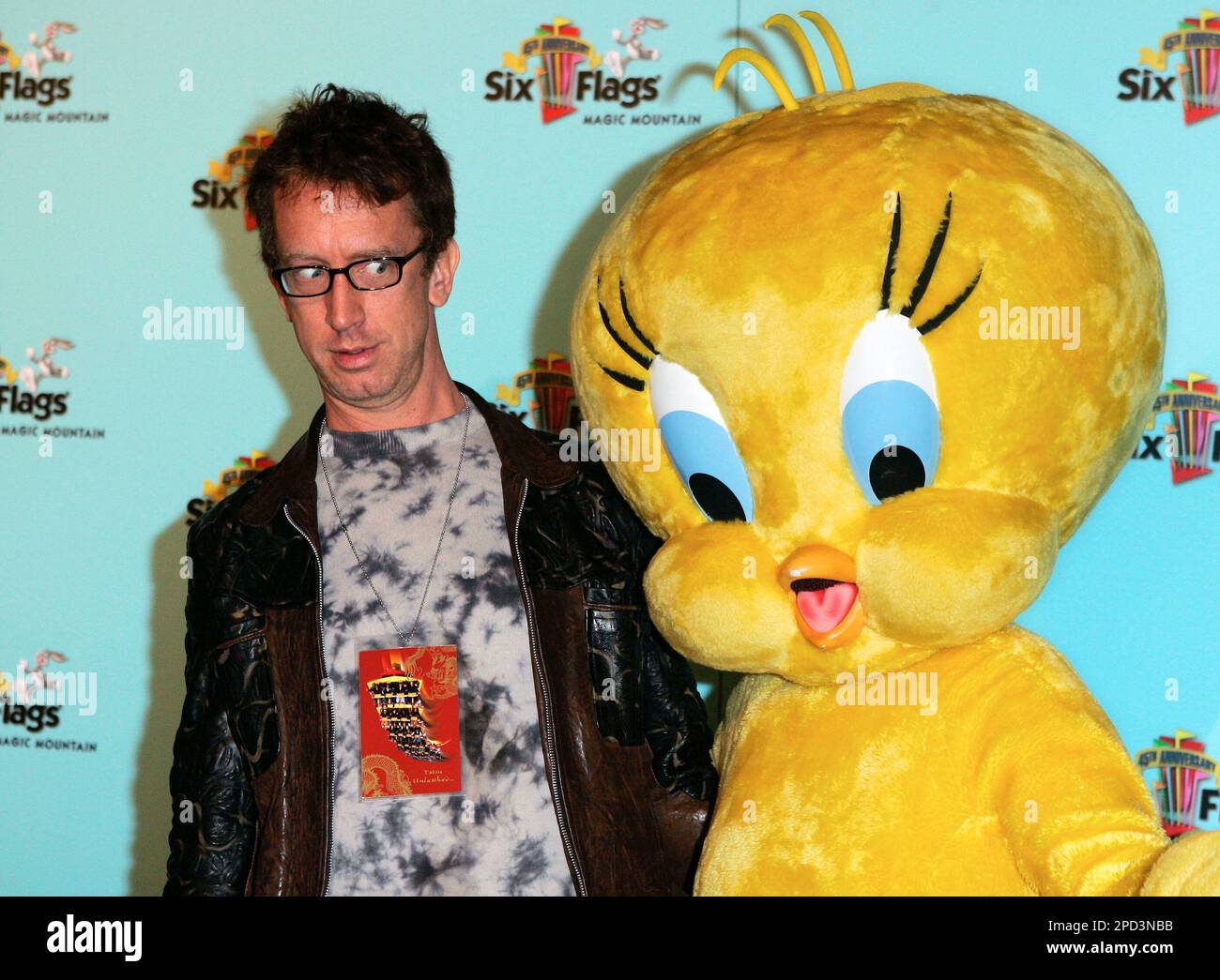 Actor Andy Dick poses with a person dressed as the cartoon character ...