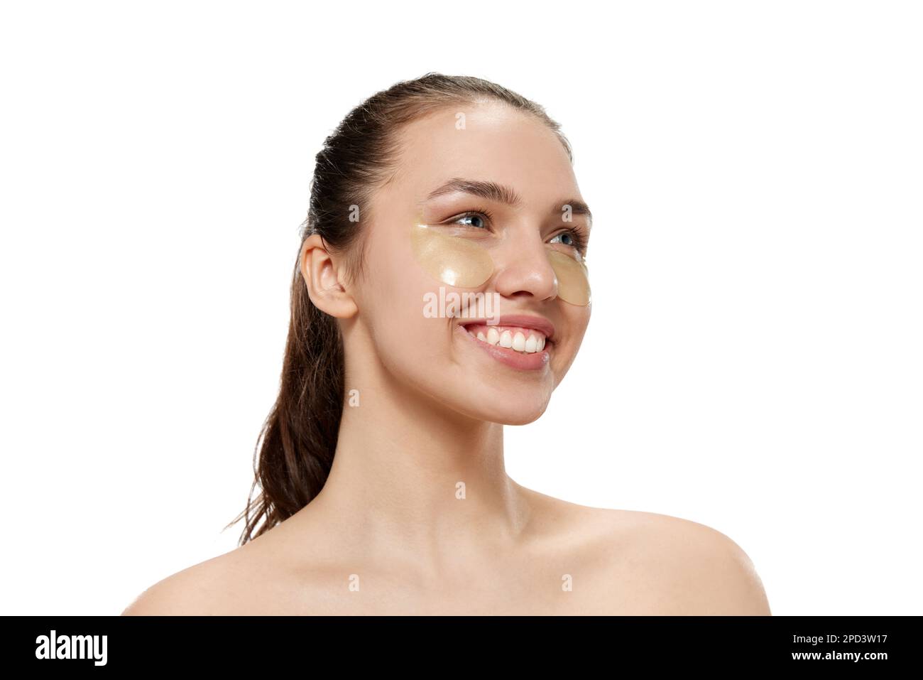 Smiling young beautiful girl with well-kept skin isolated over white ...