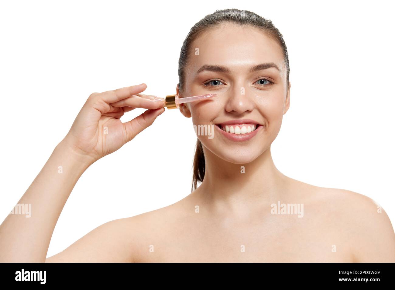 Happy beautiful young woman with smooth clean face skin posing over ...