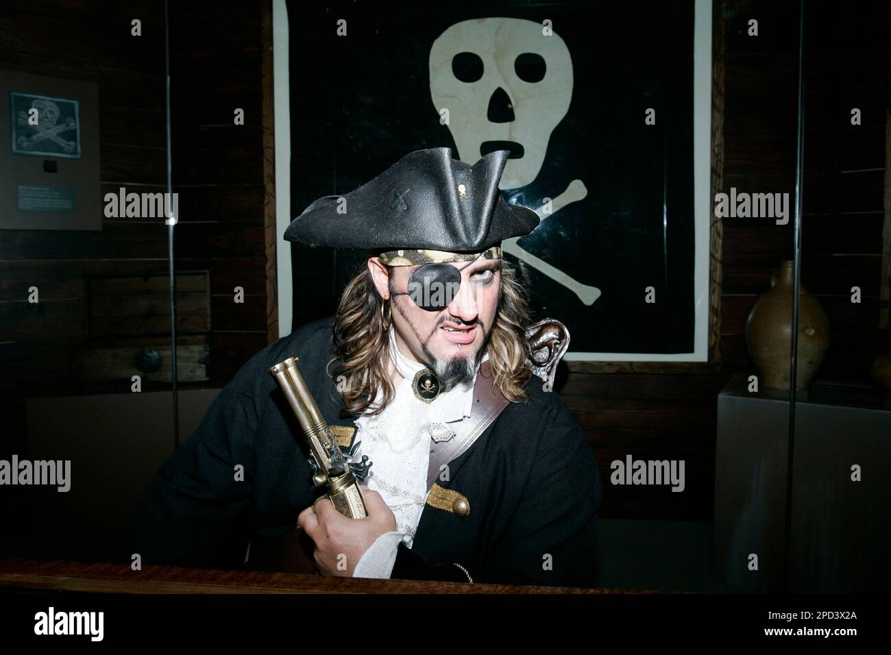 A character portraying a Capt. Blackthorn poses in front of a real ...