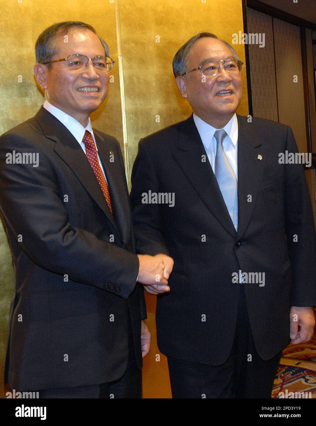 Canon Inc. President Fujio Mitarai, right, and Executive Vice President ...