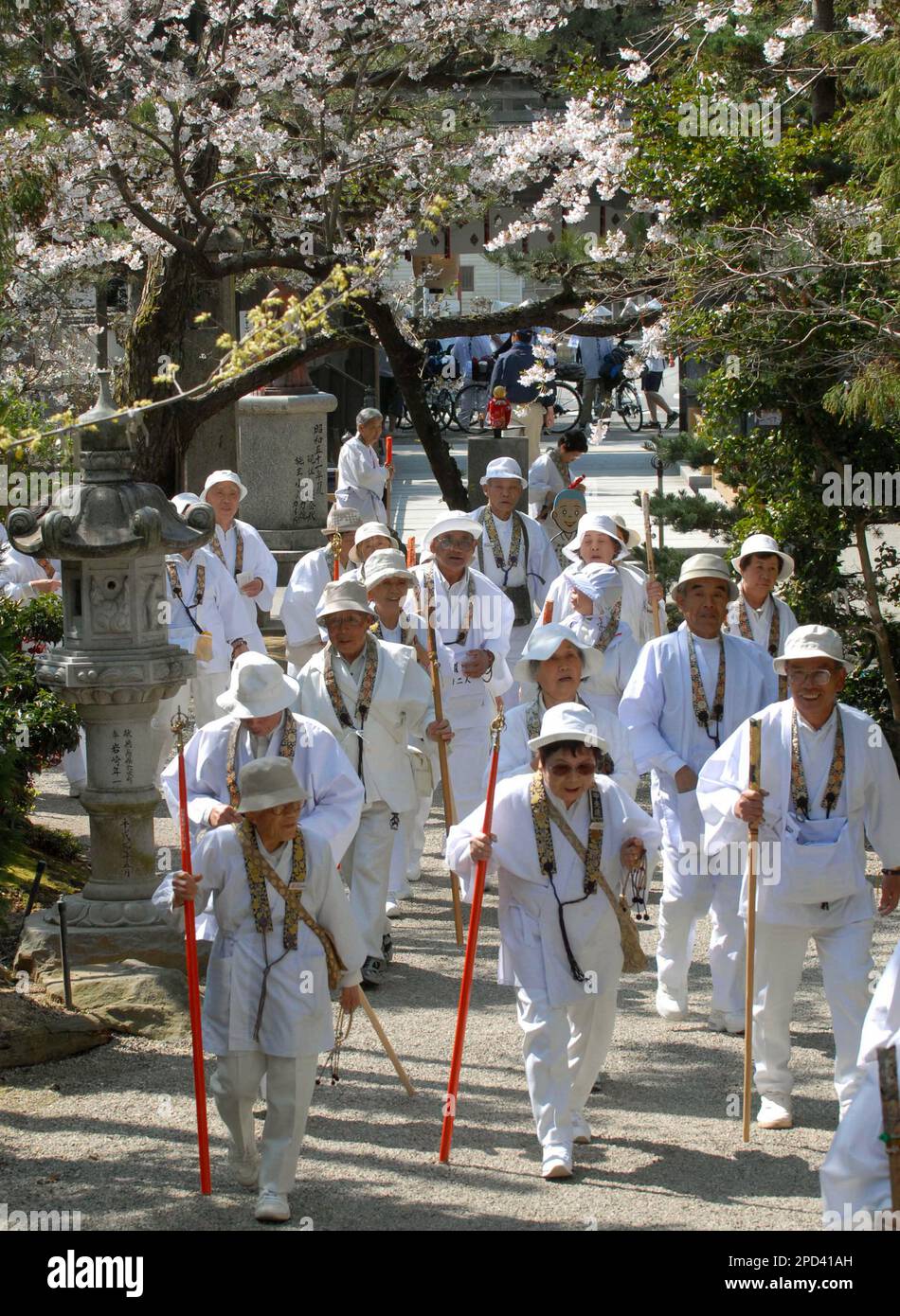 **ADVANCE FOR FRIDAY MAY 12 ** A group of senior pilgrims walk ...