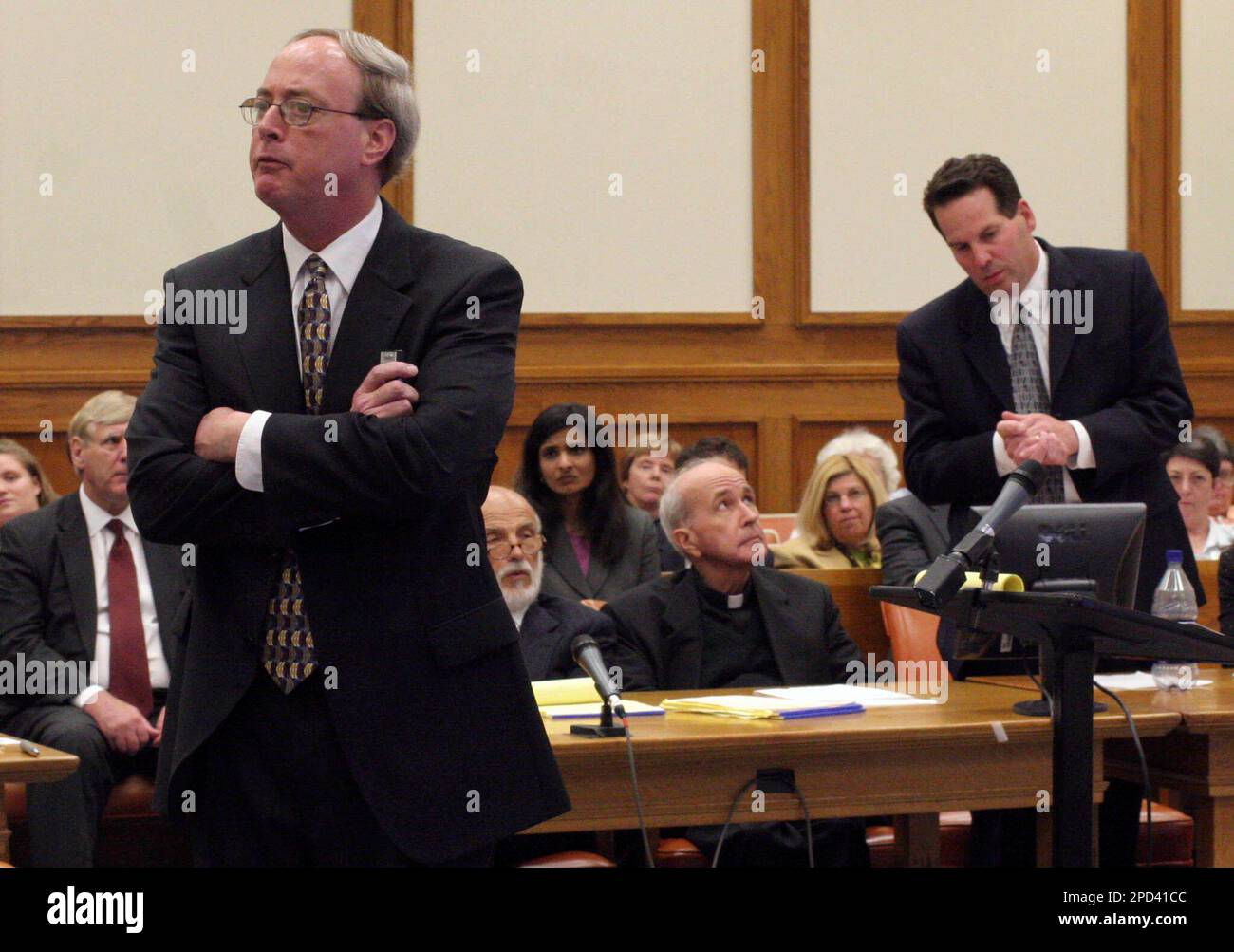 Lucas County assistant prosecutor Chris Anderson, left, gives the ...