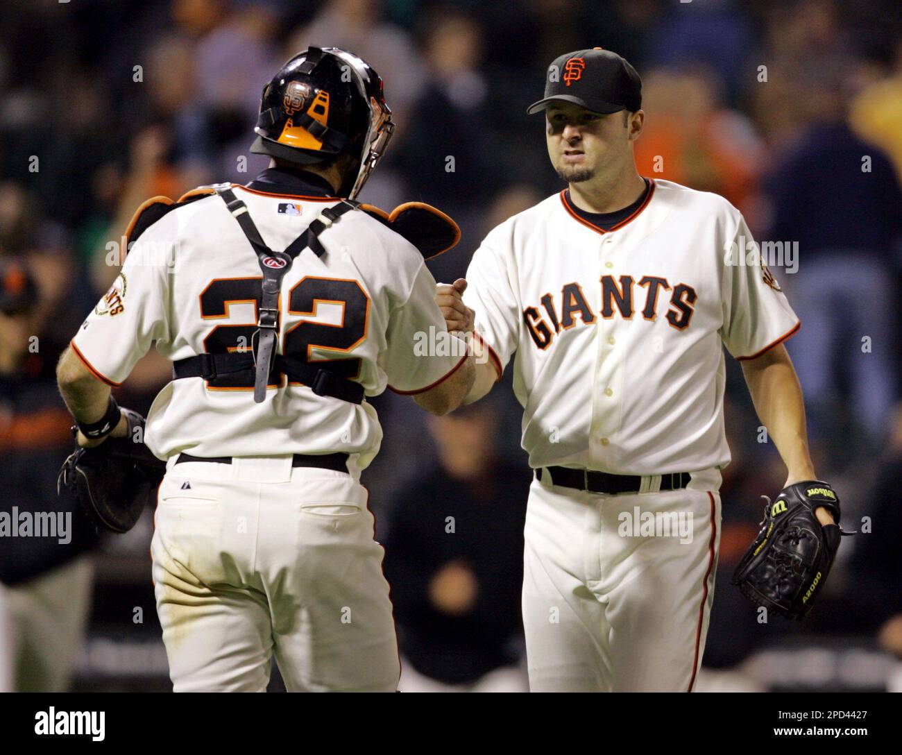 San Francisco Giants pitcher Jason Schmidt, right, and catcher Mike ...