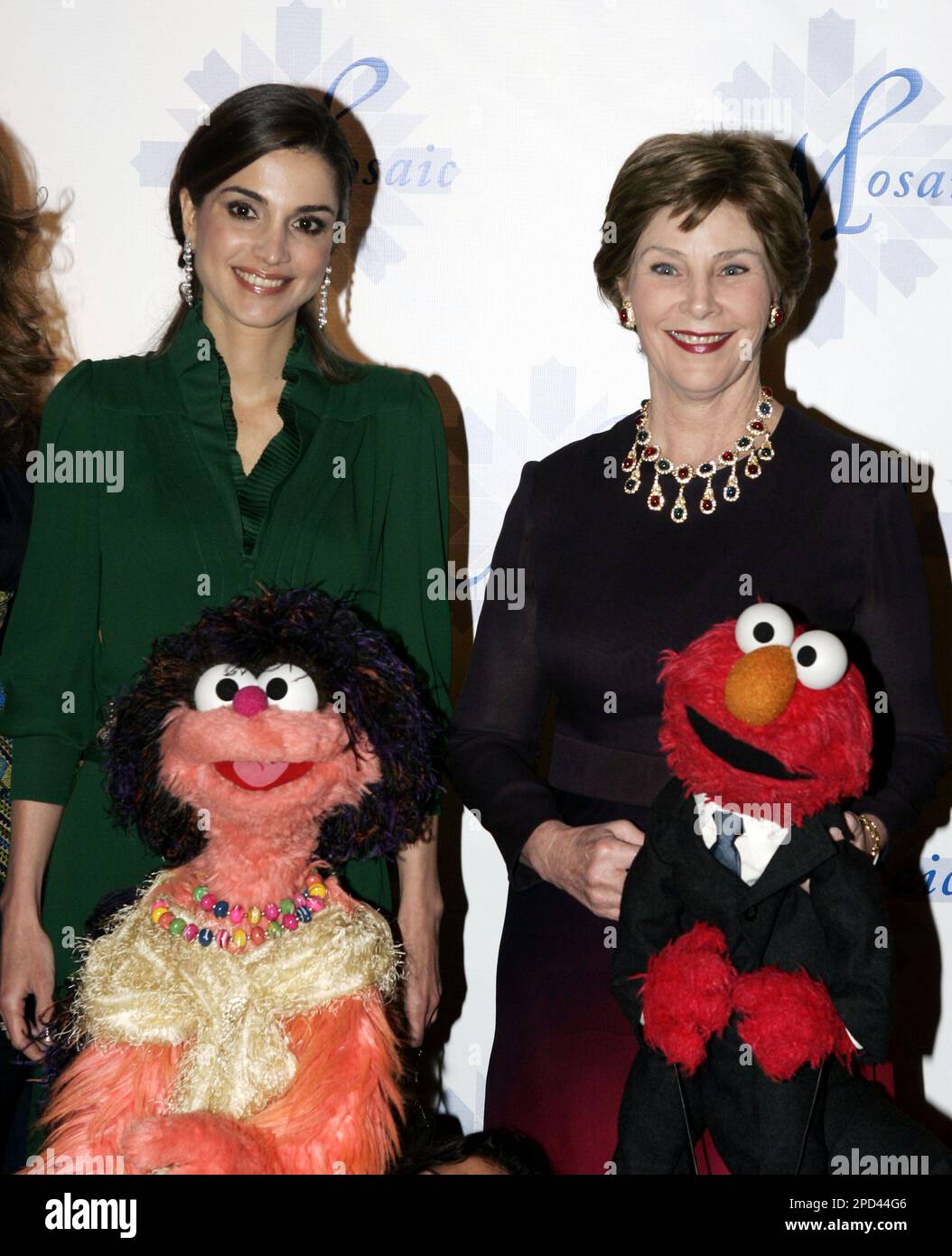 Queen Rania Al-Abdullah of Jordan, left, and first lady Laura Bush ...