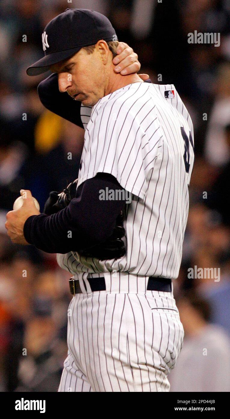 New York Yankees pitcher Randy Johnson reacts after Boston Red Sox's ...