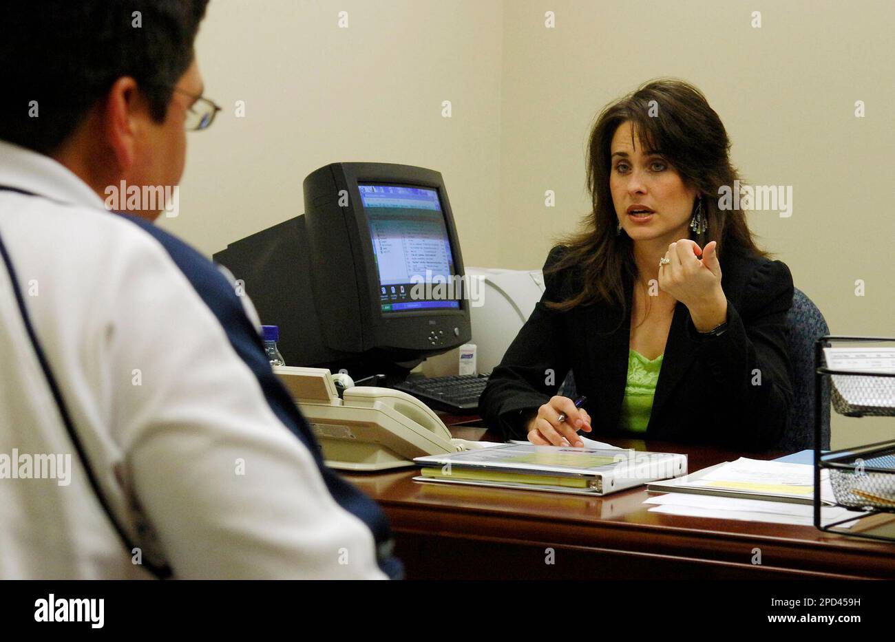 Nikki Borges meets with equipment director Dana Marquez in her office ...