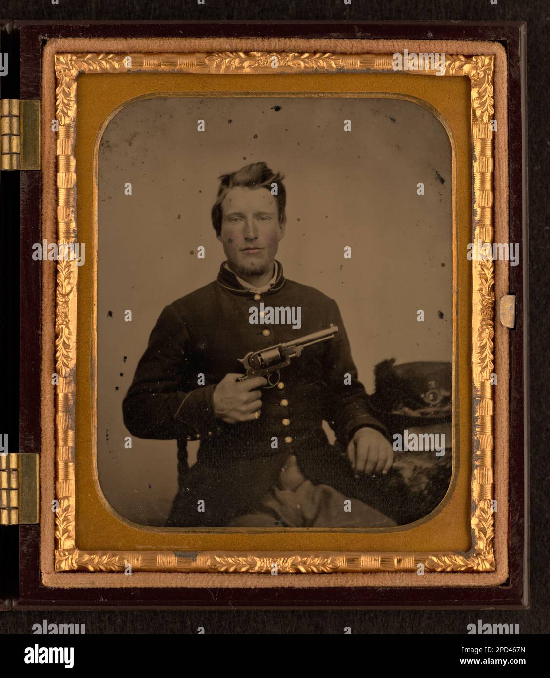 Unidentified soldier in Union uniform with Starr DA revolver ...