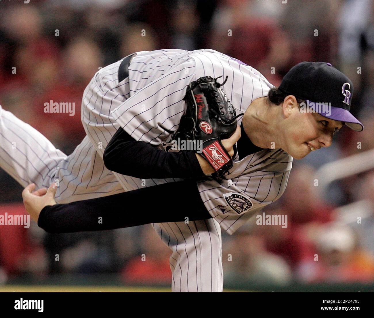 Colorado Rockies starting pitcher Jeff Francis follows through on his ...
