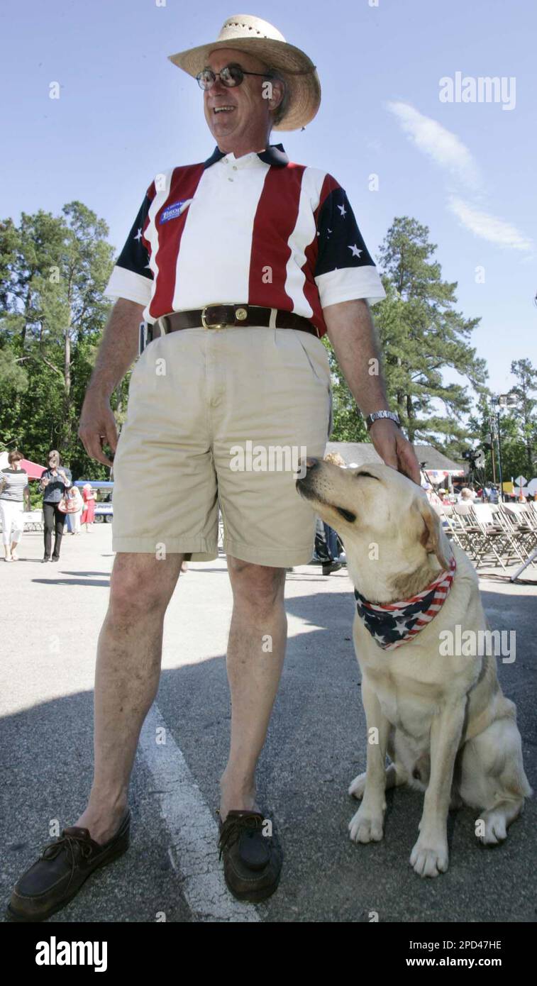 Hal Cottingham with his yellow lab "stump" talks about what it means to ...