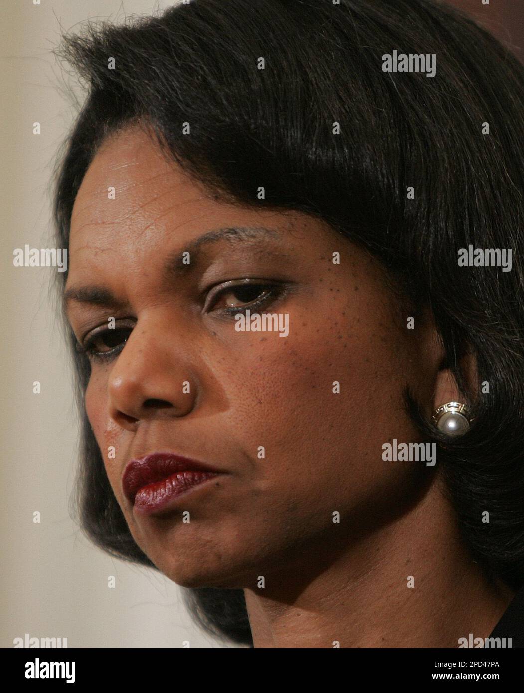 Secretary of State Condoleezza Rice listens to President Bush make a ...